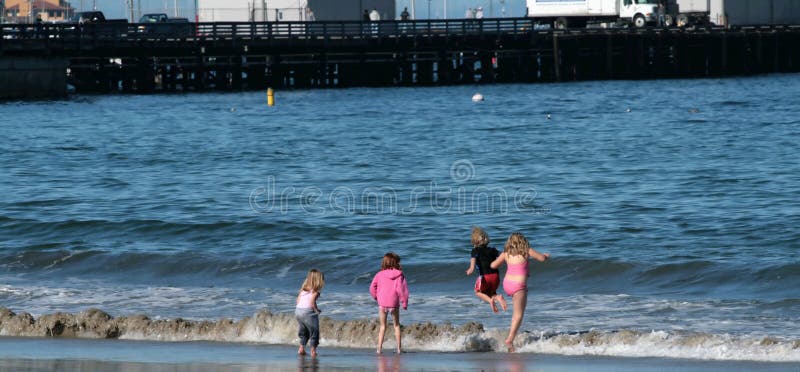 Girls at the Beach stock photo. Image of swimsuit, blue - 1815820