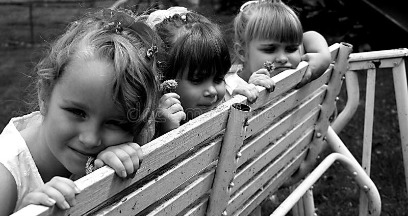 Girls on the bench stock image. Image of easter, sunday - 1587847