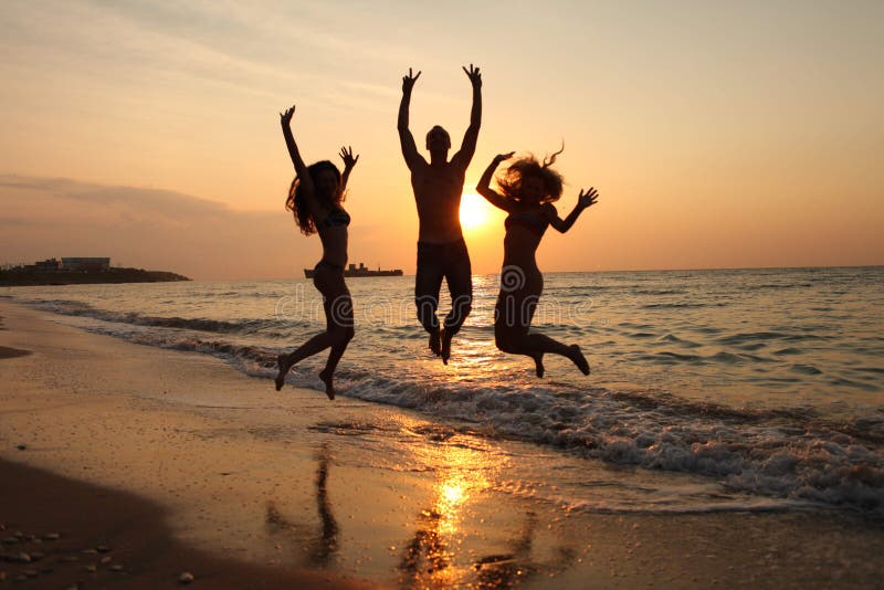 Girls DANCING in SUNSET on SEA Stock Image - Image of beacon, adult ...