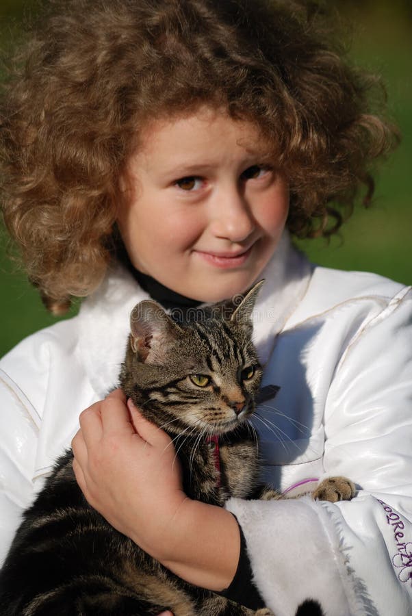 Girls cat stock image. Image of children, expression, face - 7202307
