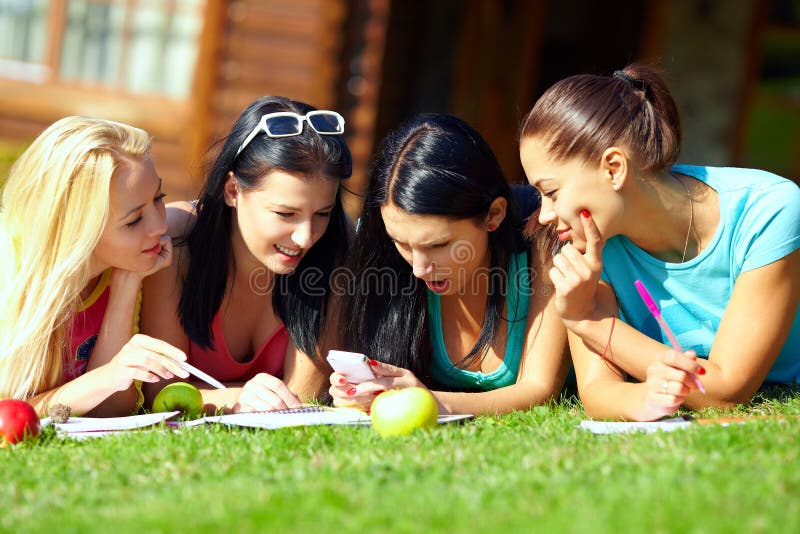 Girls Chatting in Social Network on Green Lawn Stock Photo - Image of ...