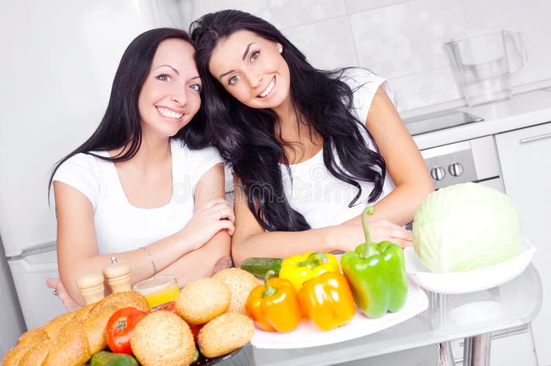 Girls cooking stock image. Image of beautiful, cheerful - 17551199