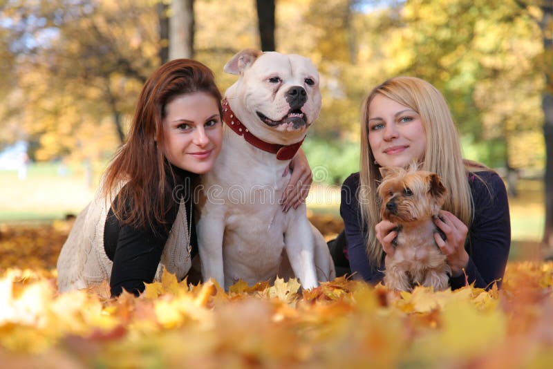 Girls with dogs stock image. Image of cute, owner, people - 34405233