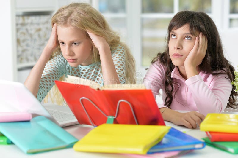 Girls doing lessons stock photo. Image of home, schoolgirl - 85318402