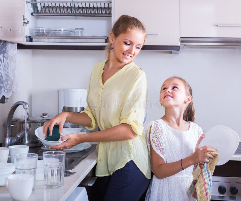 Girls Doing and Wiping Dishes in Kitchen Stock Image - Image of adult ...