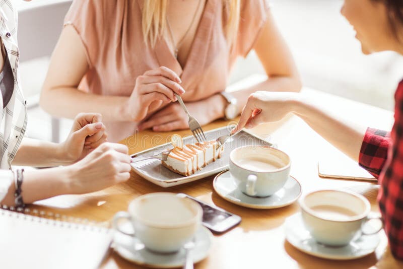 Girls Eating Cake and Drinking Coffee at Cafe, Coffee Break Stock Image ...