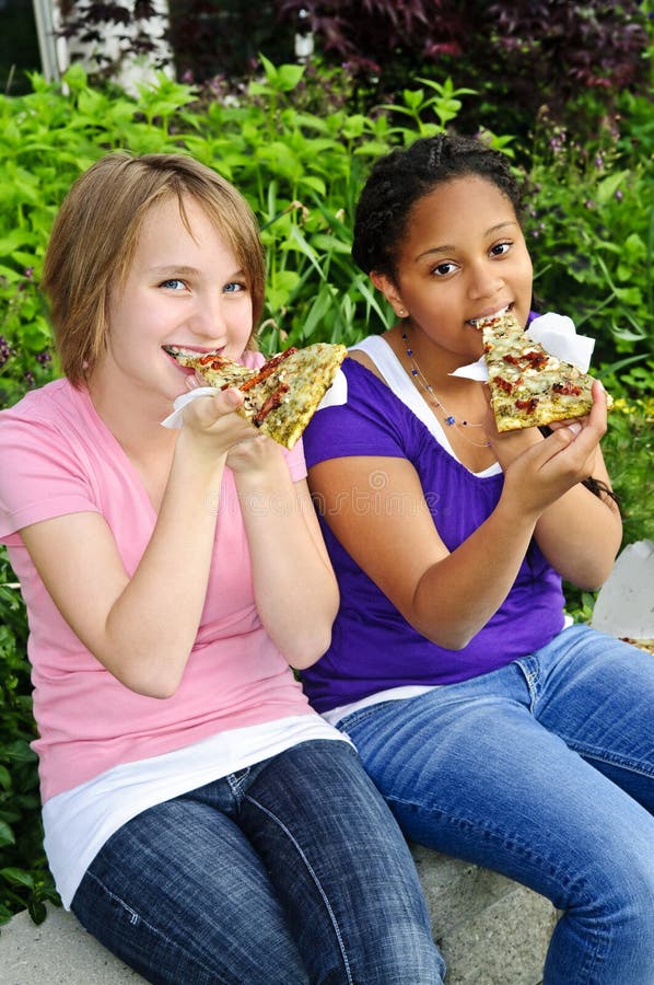 Girls eating pizza stock photo. Image of friend, dinner - 10525636