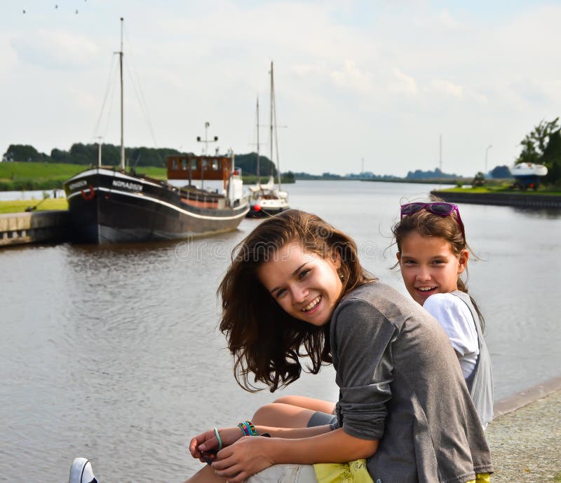 Girls enjoying holiday stock image. Image of laugh, group - 26429237