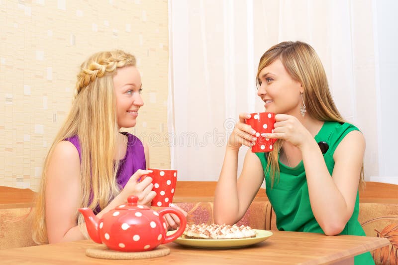 Girls Enjoying Tea stock photo. Image of brown, green - 22335020
