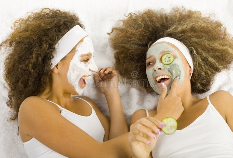 Girls with face masks stock image. Image of front, cucumber - 3216283