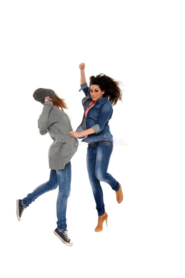 Girls fight stock photo. Image of jumping, jean, casual - 23013752