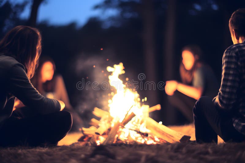 Girls Friendship Group Sit Round a Bright Campfire at Night Stock ...