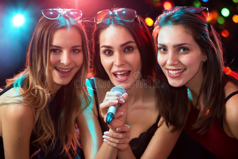 Girls Having Fun Singing at a Party Stock Photo - Image of nightclub ...