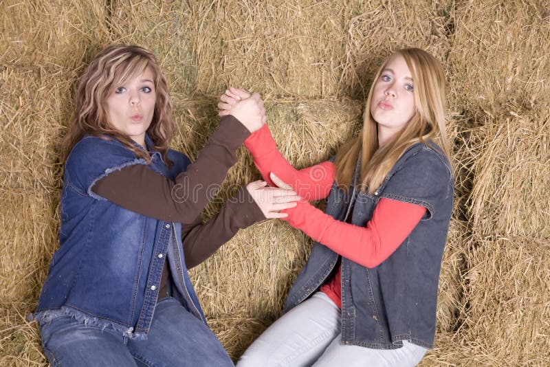 Girls on Haystack Having Fun Stock Image - Image of emotion, farm: 12029775