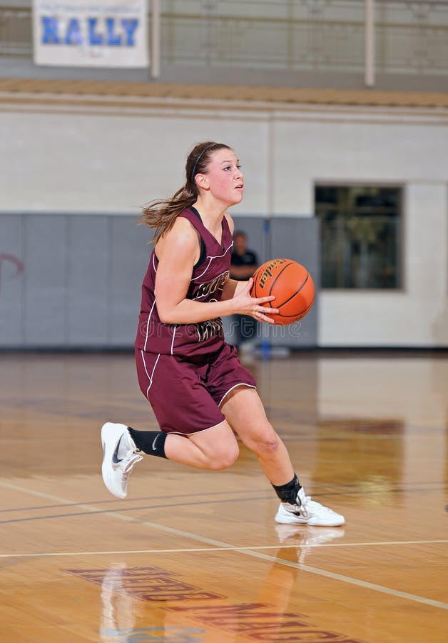 Girls High School Basketball Editorial Image - Image of women, assist ...