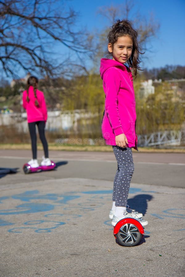 Girls on the hoverboard stock image. Image of rider, power - 92765957