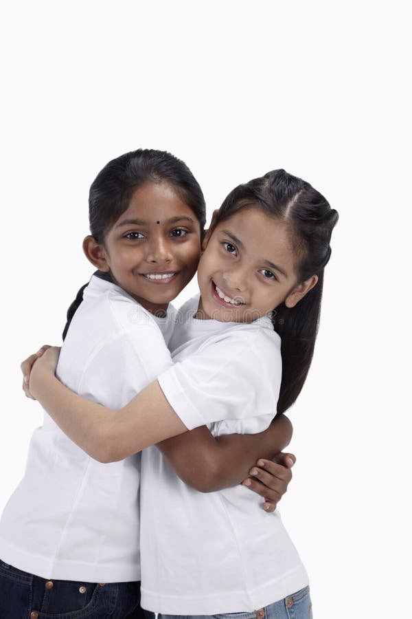 Girls Hugging and Smiling at the Camera. Conceptual Image Stock Image ...
