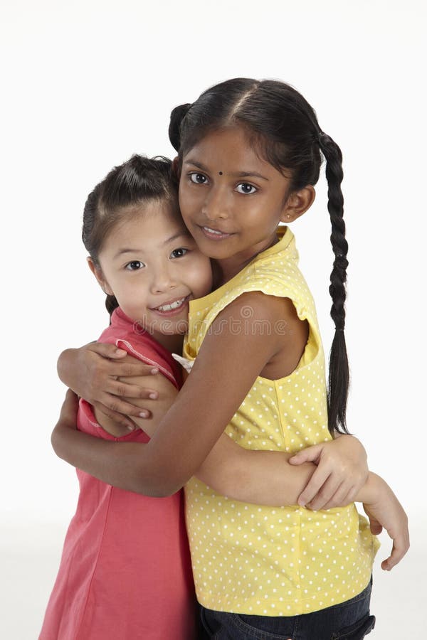 Girls Hugging and Smiling at the Camera. Conceptual Image Stock Photo ...