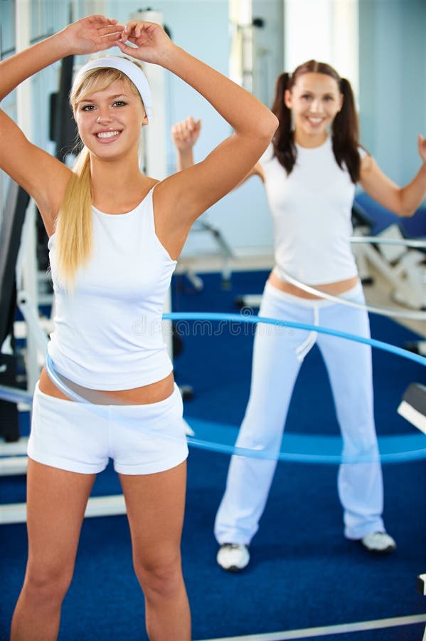 Girls with hula hoop stock image. Image of equipment - 15795293