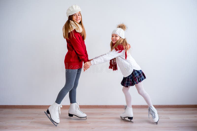 Girls on ice skates stock image. Image of child, portrait - 107450959