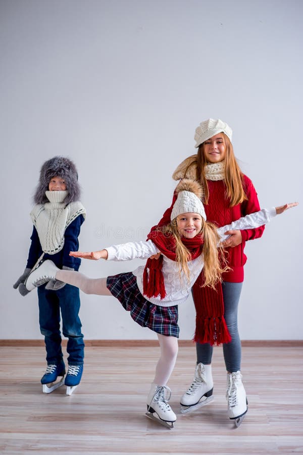 Girls on ice skates stock photo. Image of iceskating - 107450290