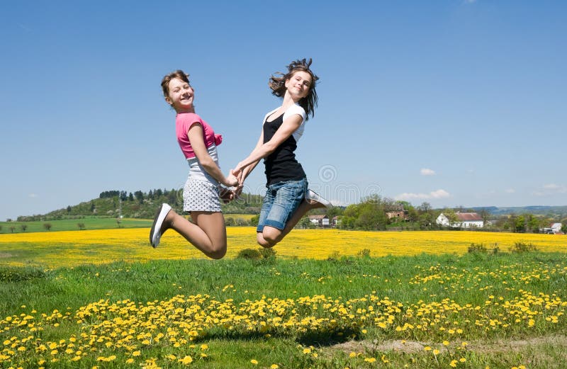 Girls jump stock photo. Image of happy, cheerful, jump - 7466994