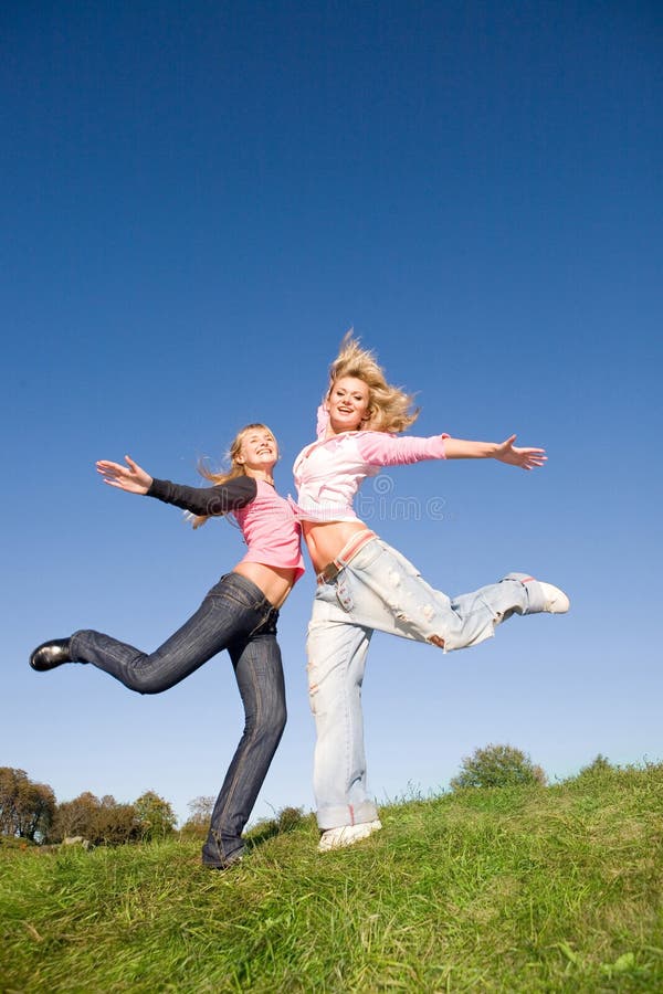 Girls jumping stock photo. Image of girls, enjoyment, dating - 8538070