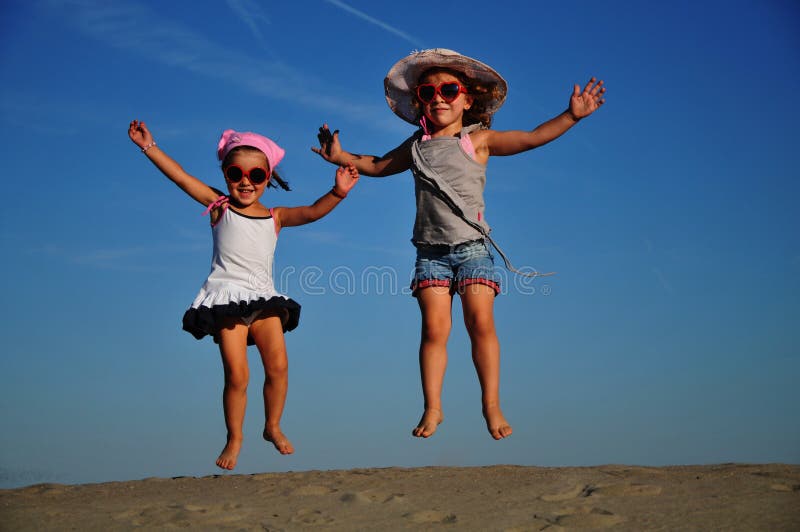 A Girl Lying on the Sandy Beach Stock Image - Image of childhood, deck ...