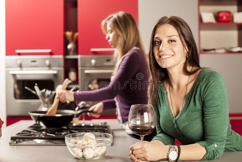 Girls in the kitchen stock photo. Image of female, interior - 27845662