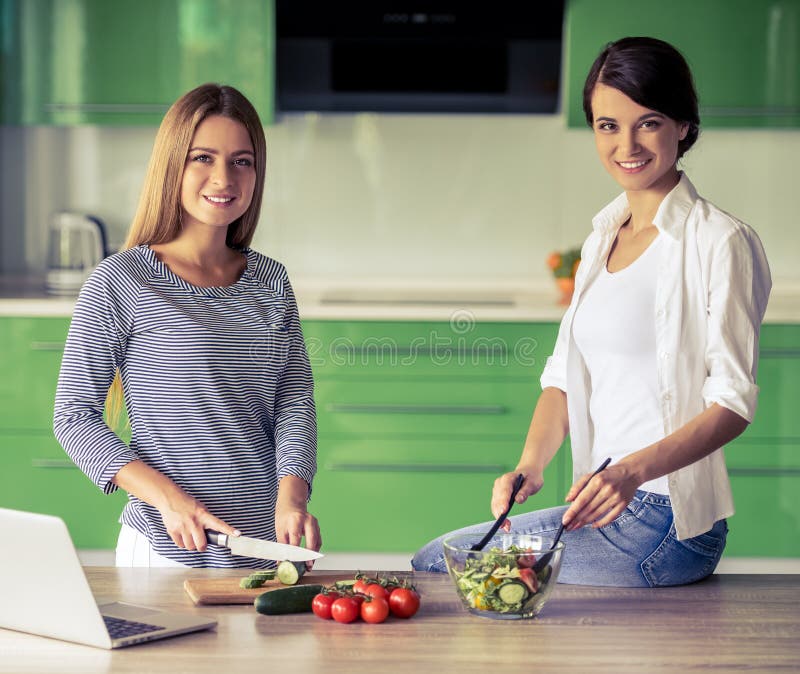 Girls in the kitchen stock image. Image of caucasian - 75521771