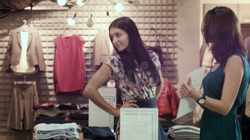 Girls Laugh and Measure Skirts Stock Footage - Video of hanger, happy ...