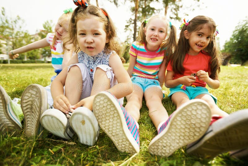 Girls on lawn stock image. Image of group, adorable, outdoor - 75851441