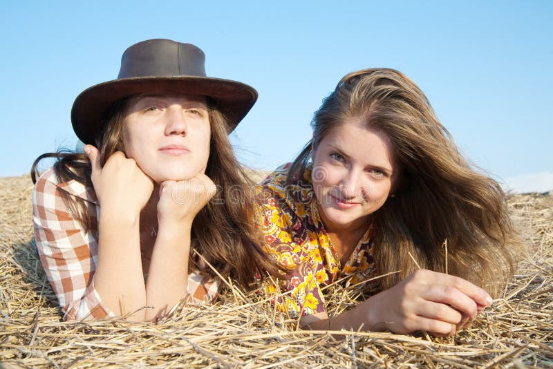 Girls Laying In Hay Picture. Image: 13604718