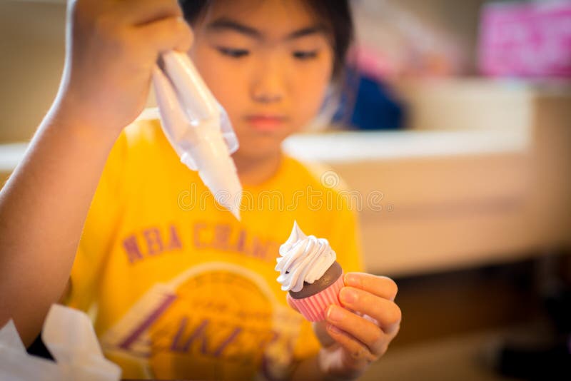 Girls Making Craft Cakes Using Silicone Paste Stock Photo - Image of ...