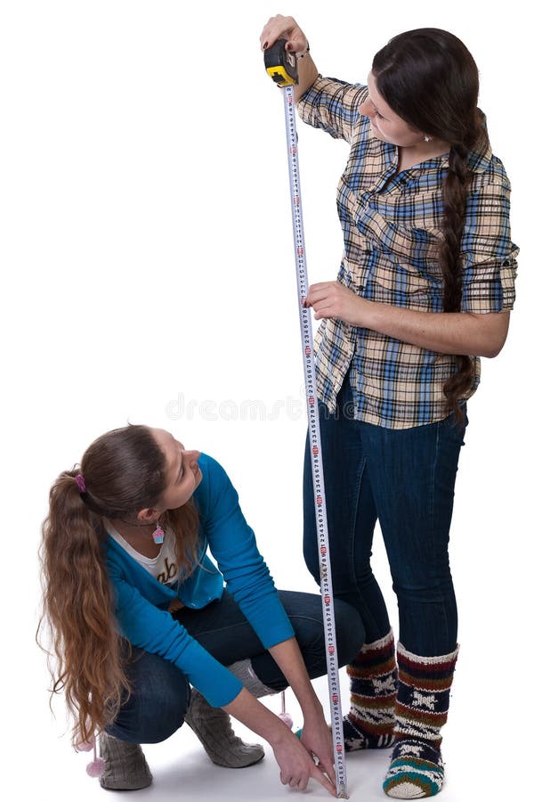 Girls measure stock image. Image of white, measure, people - 17999599