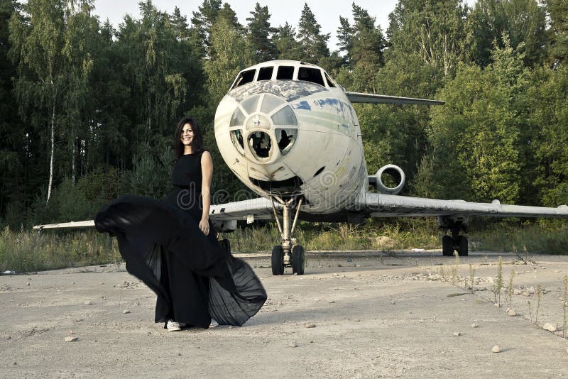 Girls next to the plane stock image. Image of deviation - 67831297