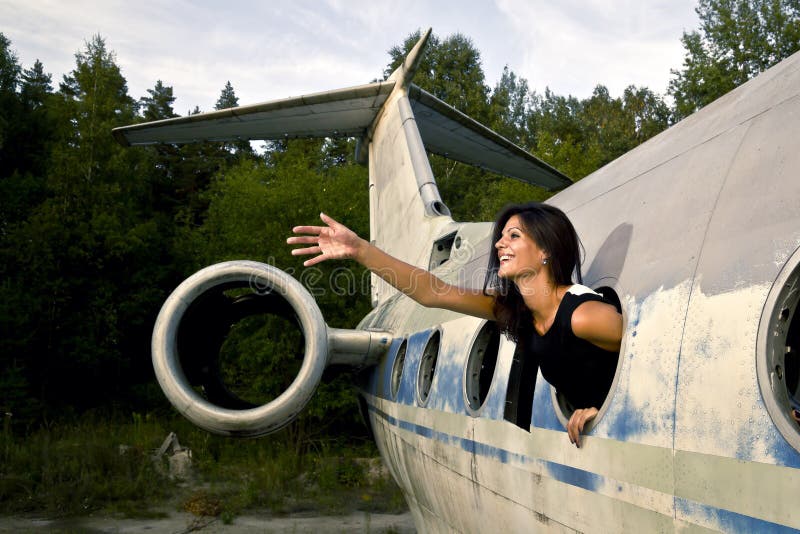 Girls next to the plane stock image. Image of deviation - 67831313