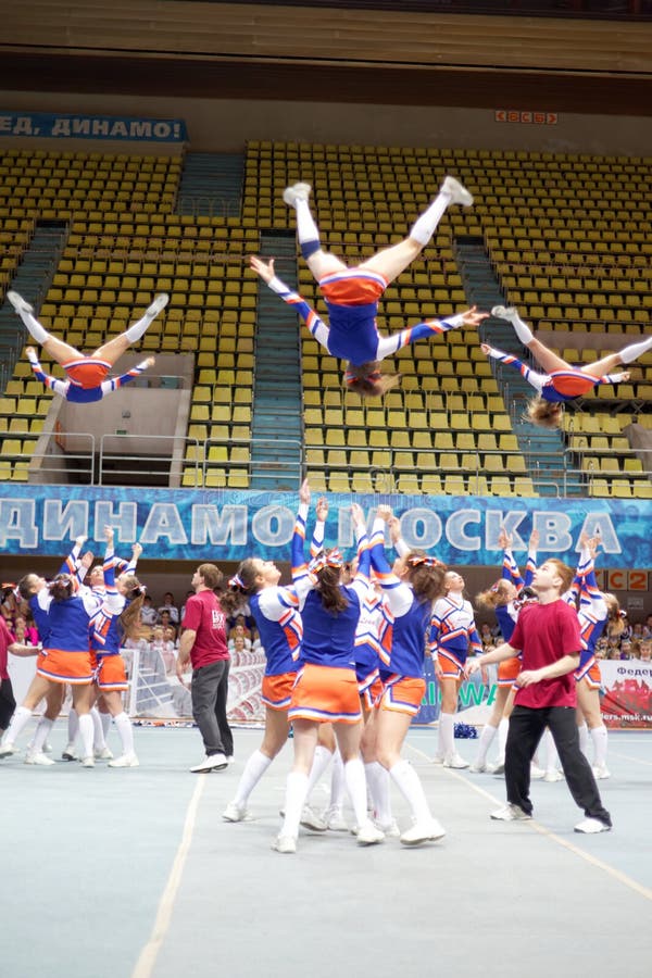 Cheerleaders Team With Male Coach Stock Image Image Of Happiness Enthusiasm 35102773