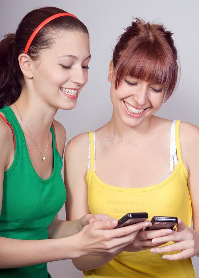 Girls on Phone stock image. Image of smile, caucasian - 12391573