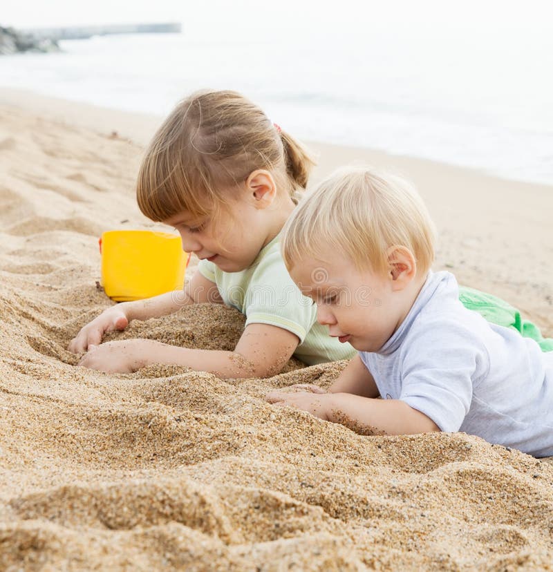 Girls play on the beach stock image. Image of girl, ball - 38943213