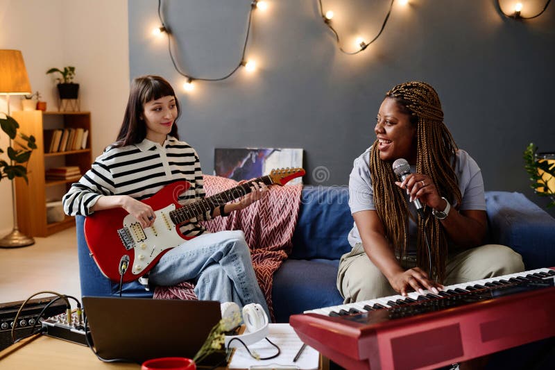Girls Playing Music Together in Studio Stock Image - Image of home ...