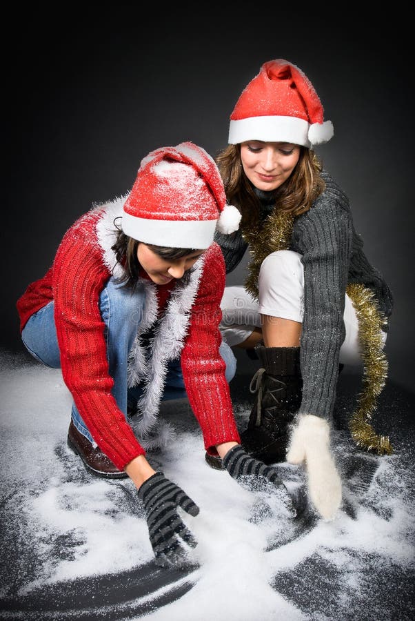 Girls Playing with Snow stock image. Image of holiday - 11135065