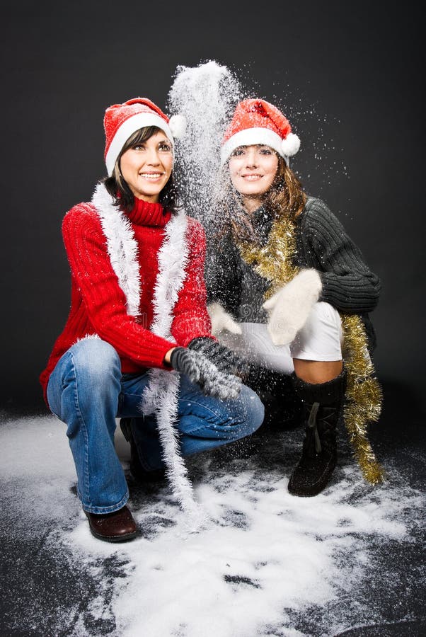 Girls Playing with Snow stock photo. Image of person, holiday - 7166894
