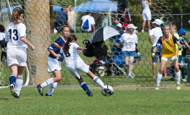 Girls playing soccer editorial image. Image of happy - 18533185