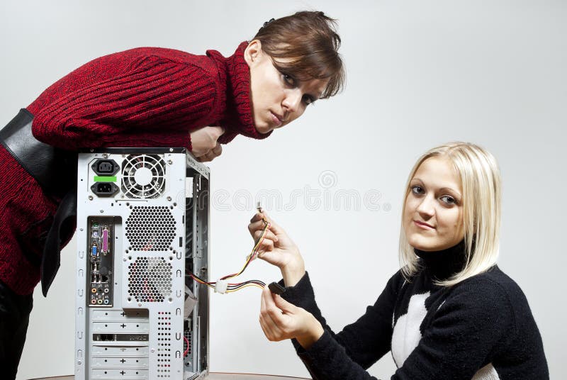 Girls Repair the System Unit Stock Photo - Image of parts, maintenance ...