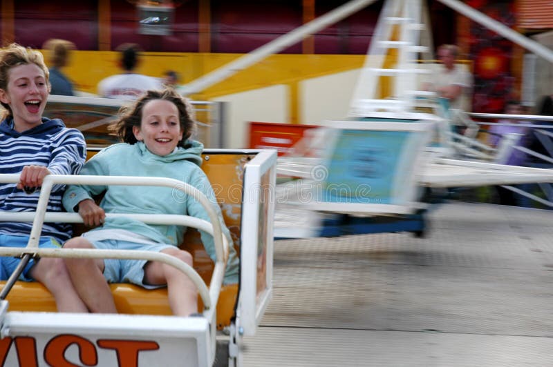 Girls on ride at fun fair stock image. Image of people - 6708015