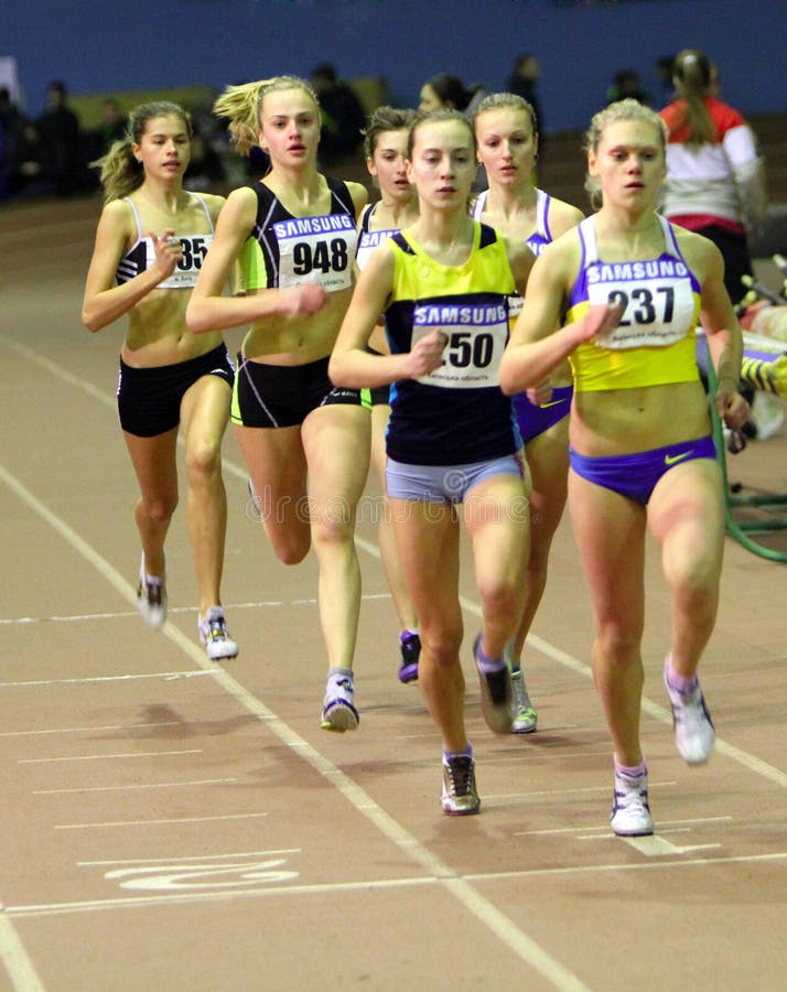 Girls run 800 meters race editorial stock photo. Image of finish - 23227683