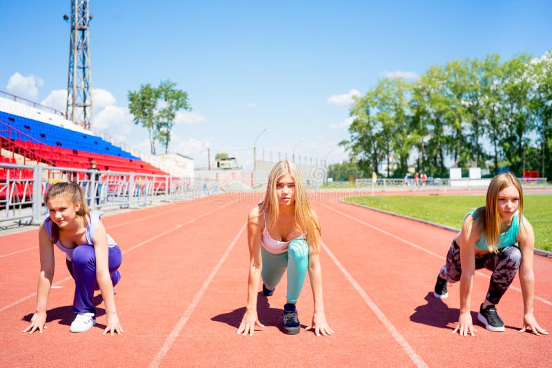 Girls running on stadium stock photo. Image of lifestyle - 101375128