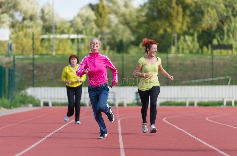 Girls running stock photo. Image of group, action, sporting - 34014094