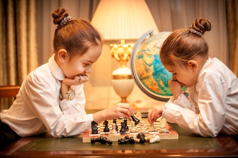 Girls in School Uniform Playing Chess at Cabinet Stock Photo - Image of ...